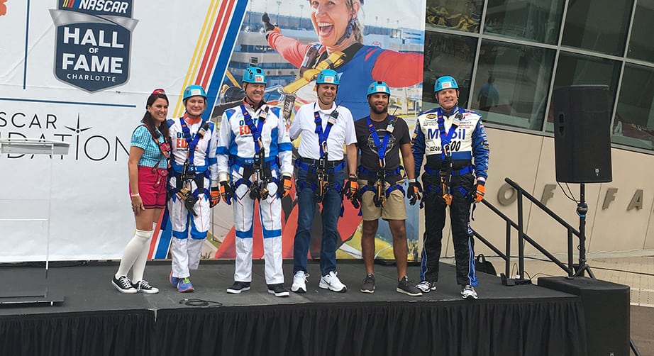 Drivers, executives go 'Over The Edge' for good cause | NASCAR.com