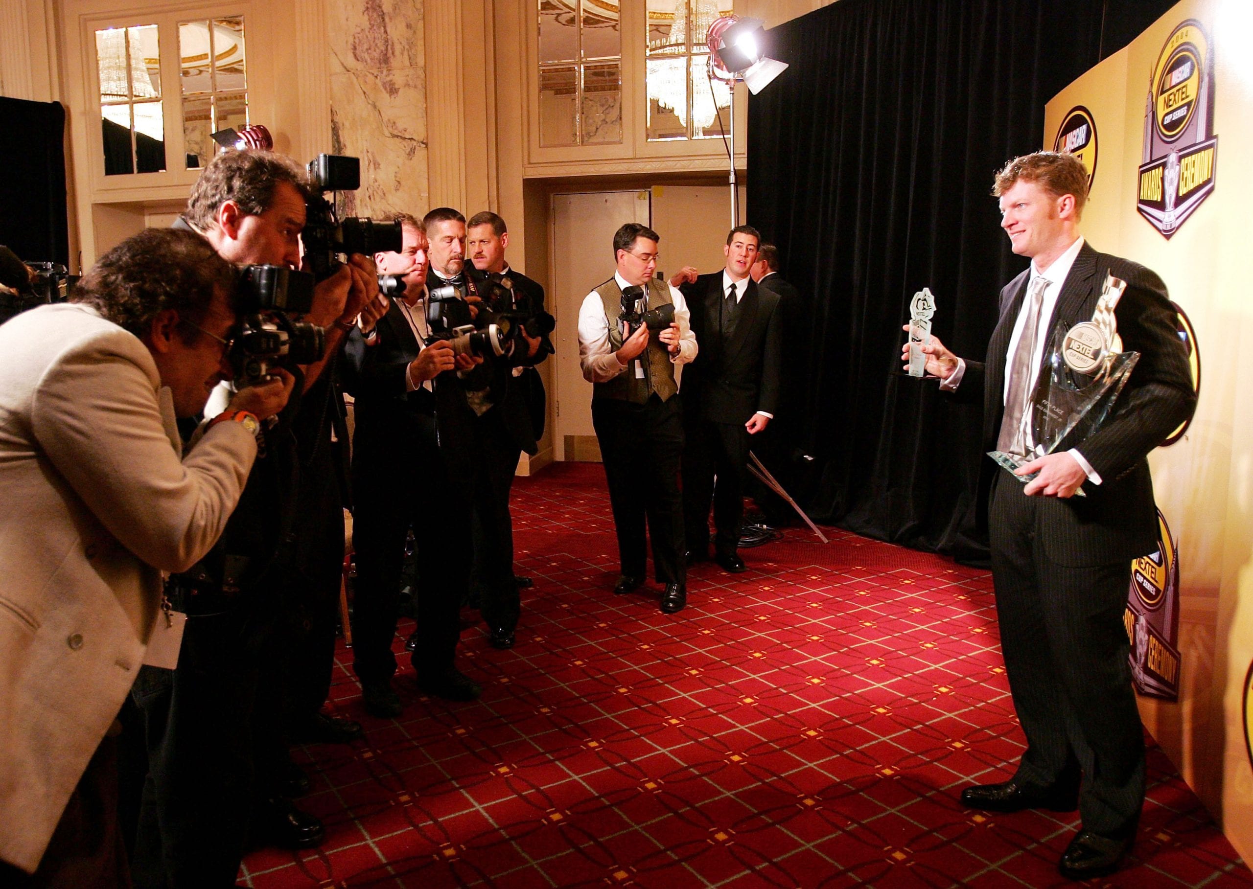 Photographers Taking Pictures At Red Carpet