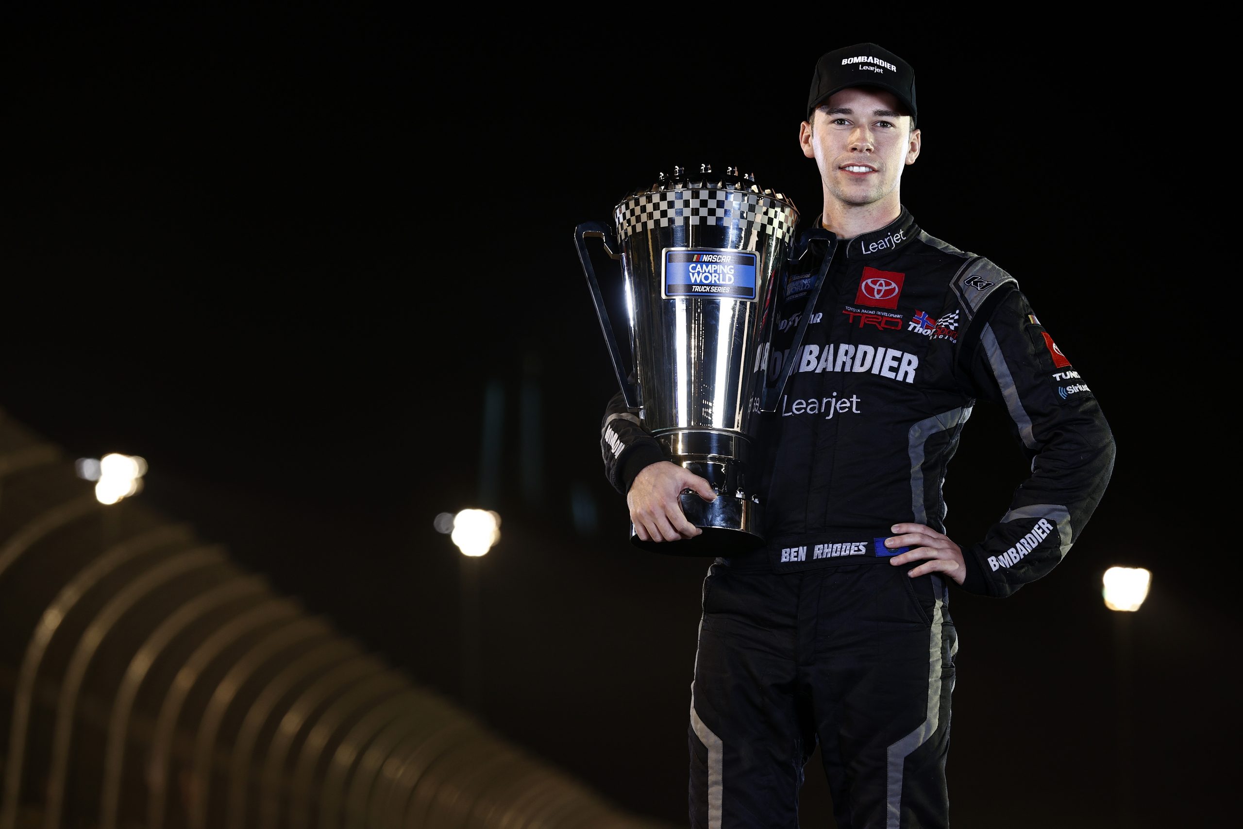 Portraits of a champion: 2021 title winners with their trophies | NASCAR
