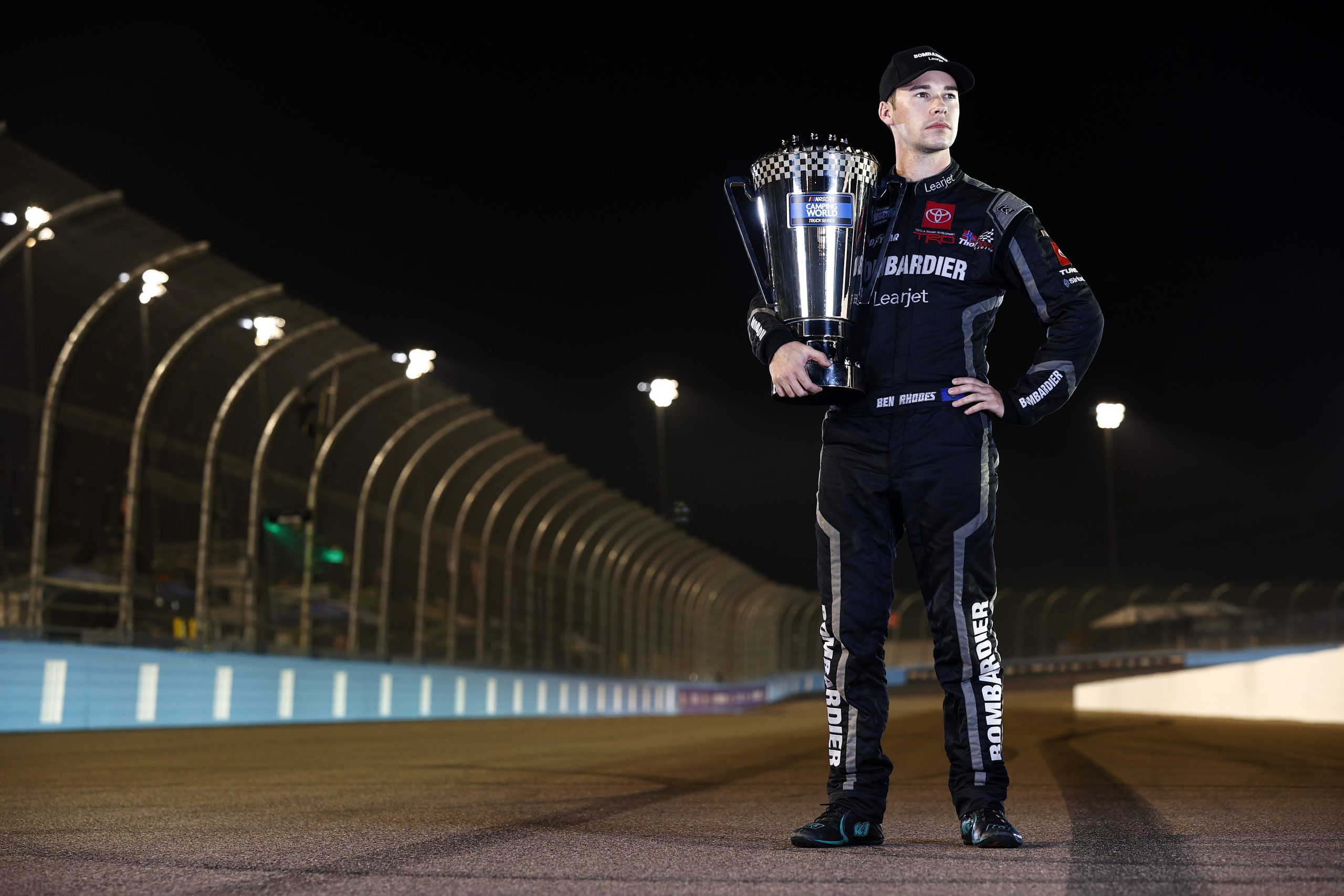 Portraits of a champion: 2021 title winners with their trophies | NASCAR