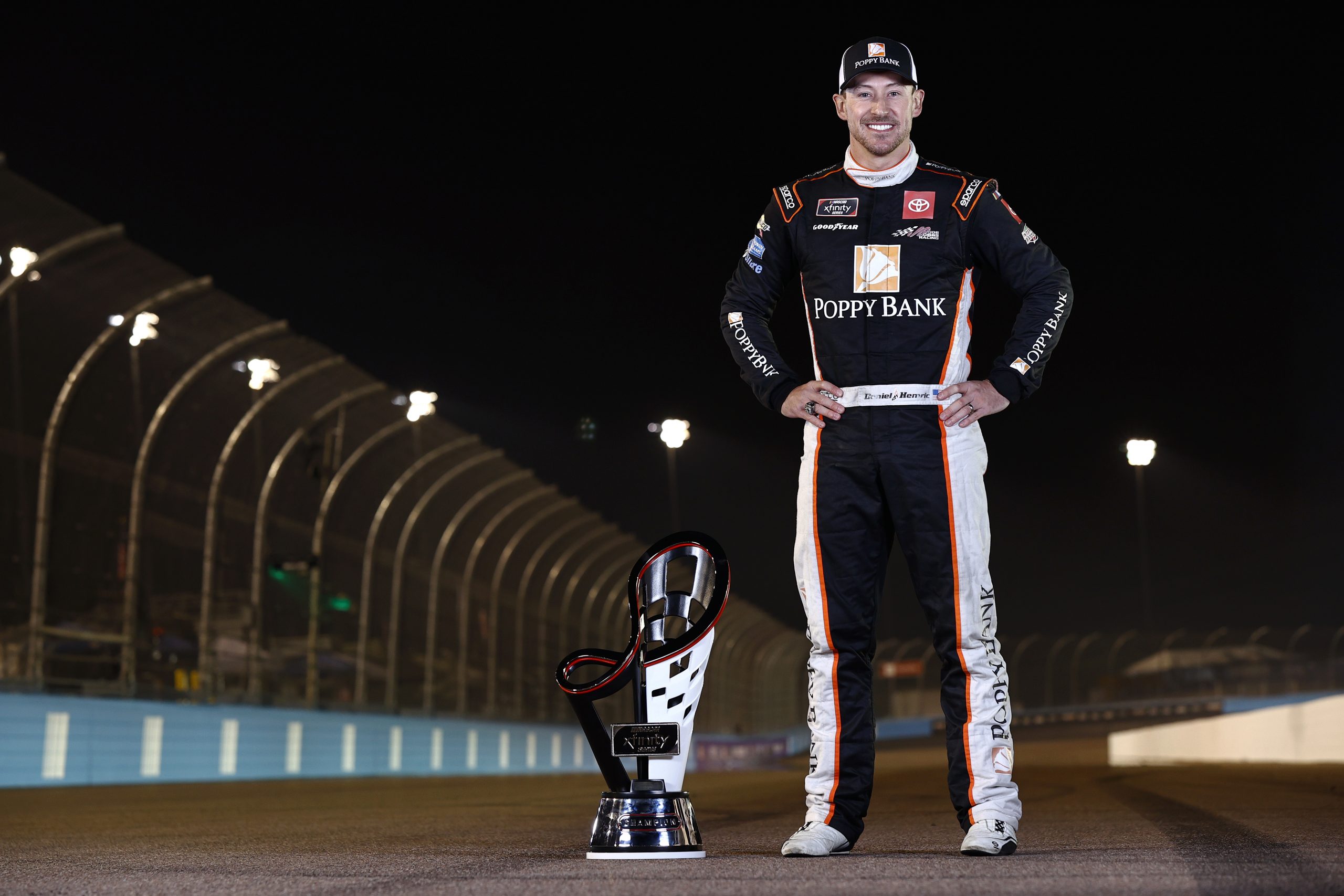 Portraits of a champion: 2021 title winners with their trophies | NASCAR
