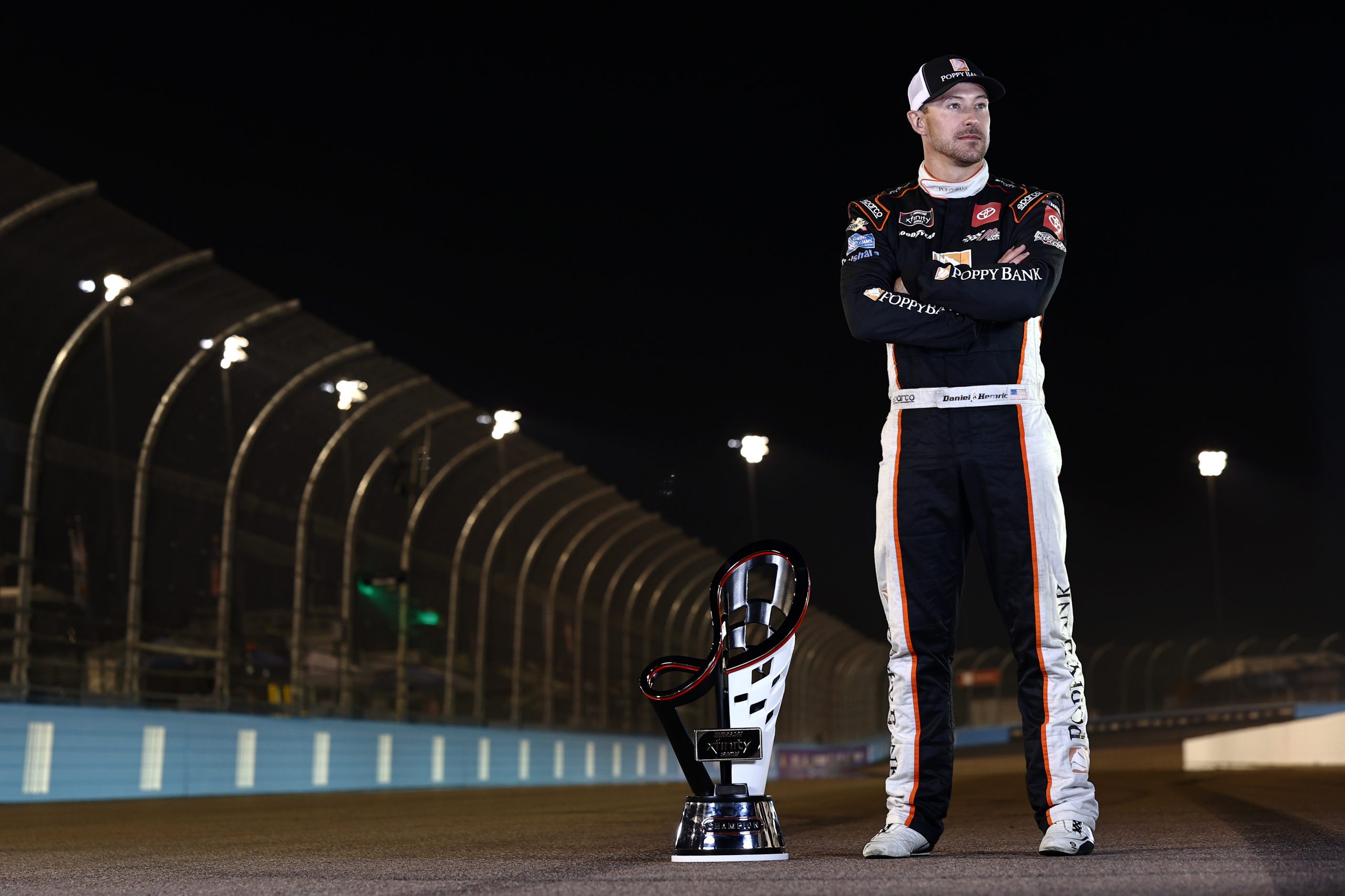 Portraits of a champion: 2021 title winners with their trophies | NASCAR