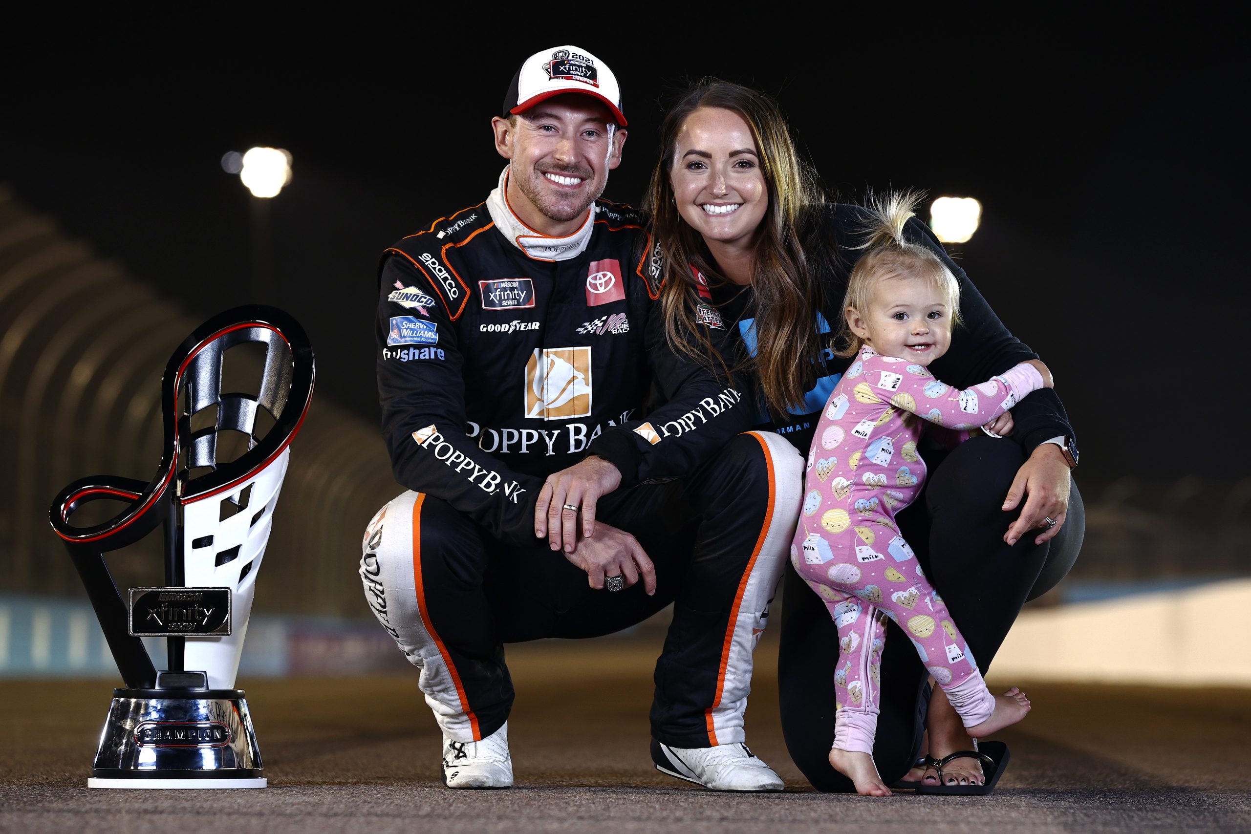 Portraits of a champion: 2021 title winners with their trophies | NASCAR