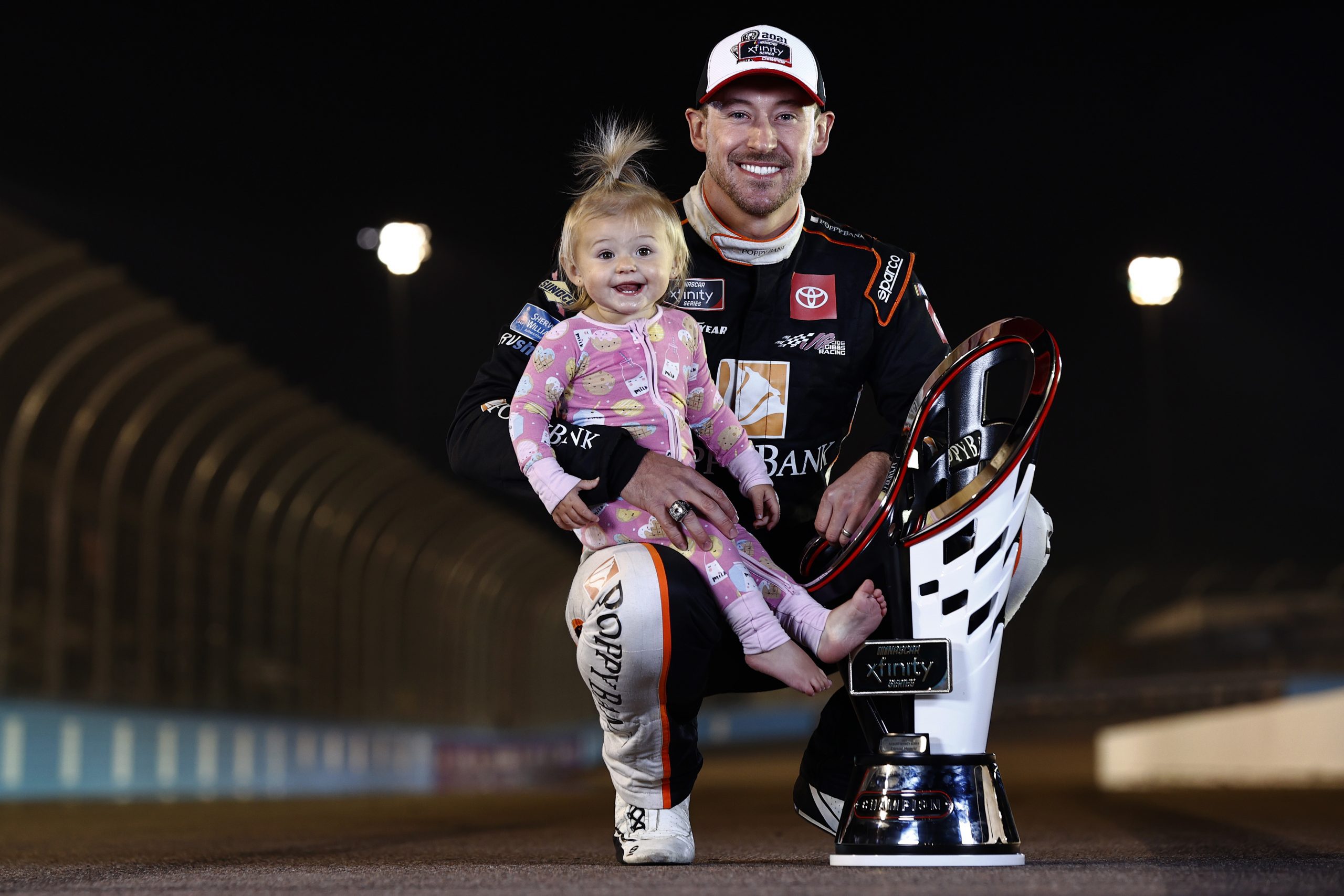 Portraits of a champion: 2021 title winners with their trophies | NASCAR