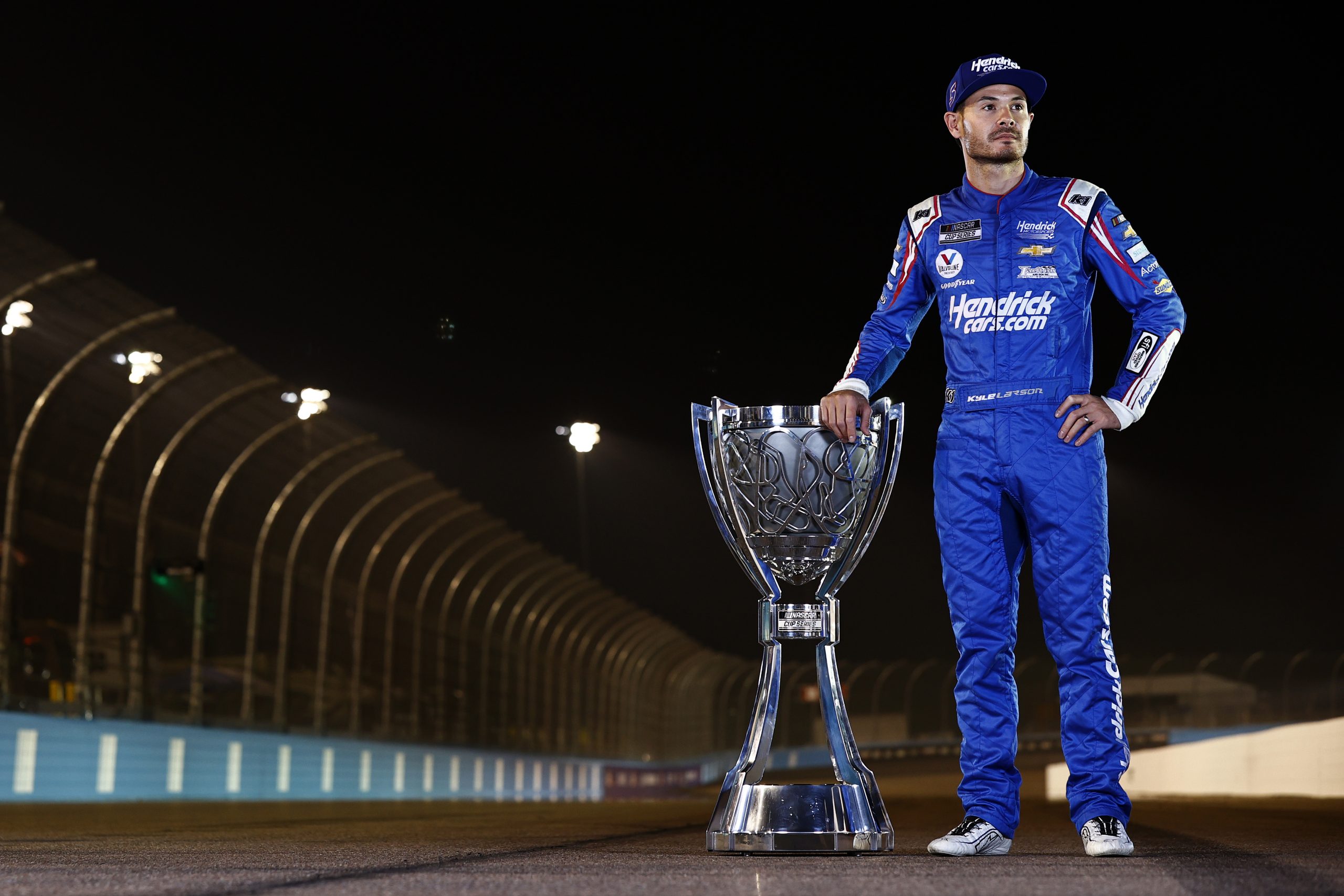 Portraits of a champion: 2021 title winners with their trophies | NASCAR