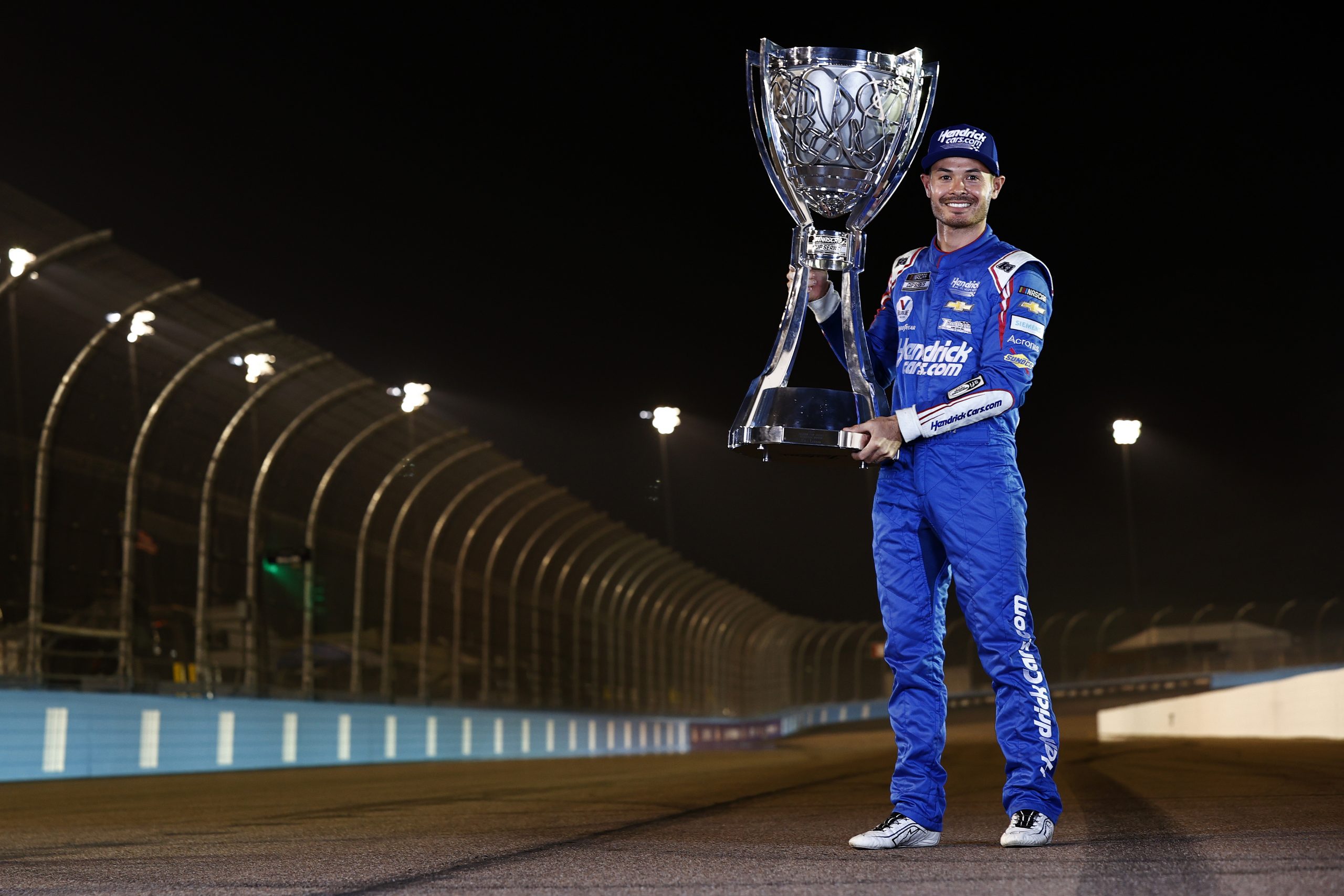 Portraits of a champion: 2021 title winners with their trophies | NASCAR