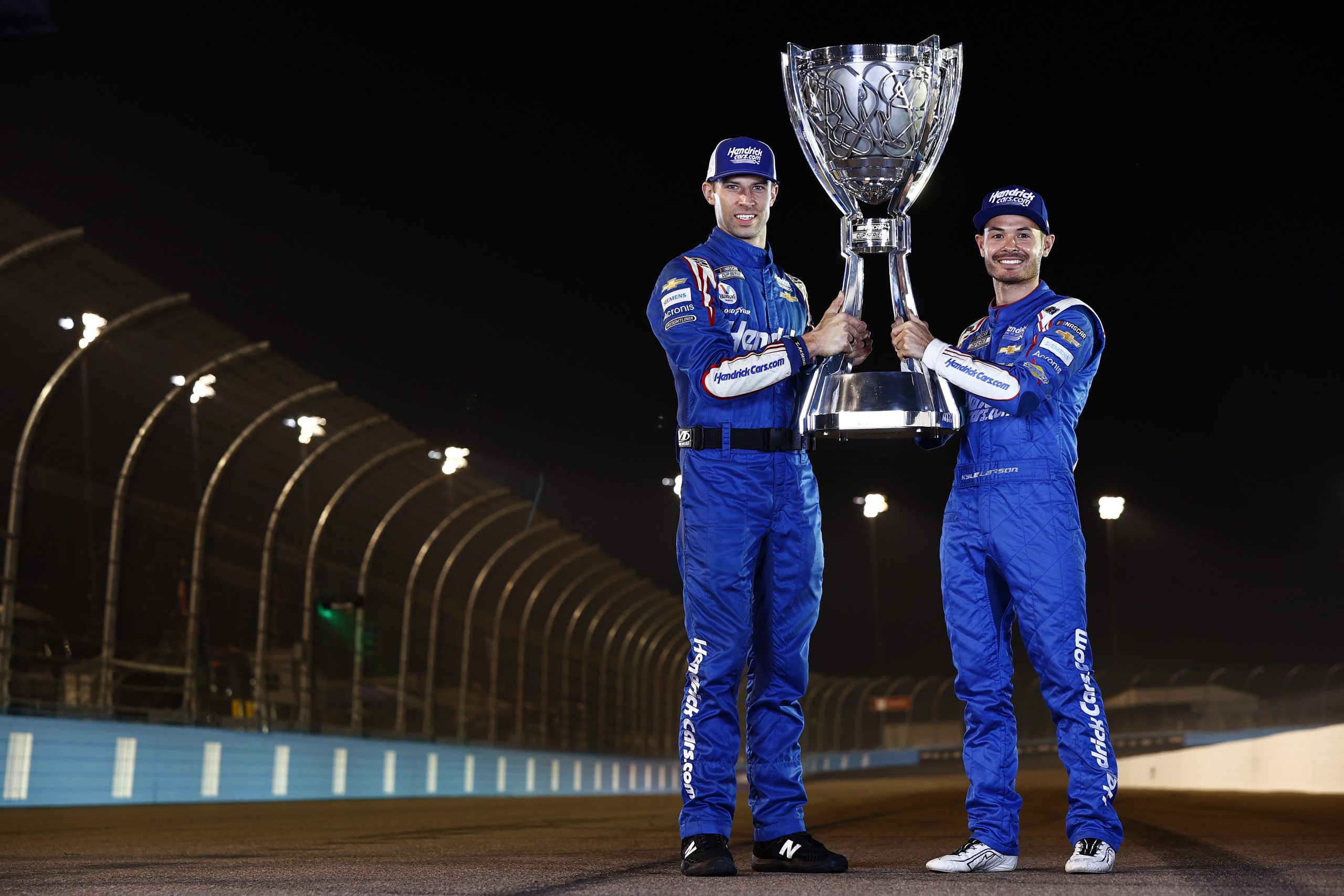 Portraits of a champion: 2021 title winners with their trophies | NASCAR