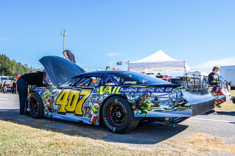 Christmas themed race cars at the Snowball Derby - Official Site Of NASCAR