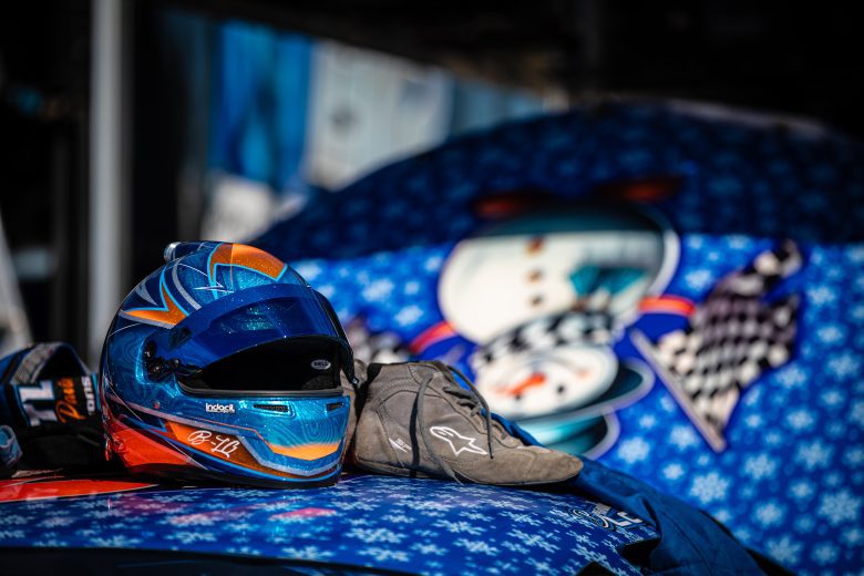 Christmas themed race cars at the Snowball Derby - Official Site Of NASCAR