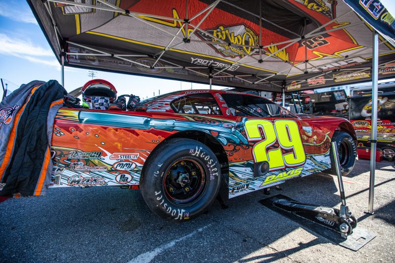 Christmas themed race cars at the Snowball Derby - Official Site Of NASCAR