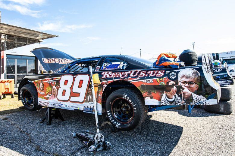 Christmas themed race cars at the Snowball Derby - Official Site Of NASCAR