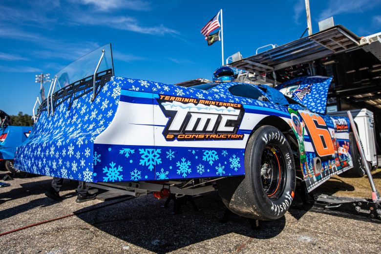 Christmas themed race cars at the Snowball Derby - Official Site Of NASCAR