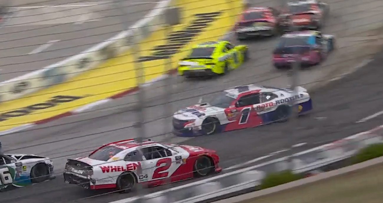 Carson Kvapil goes around in Turn 1 as drivers stack up behind ...