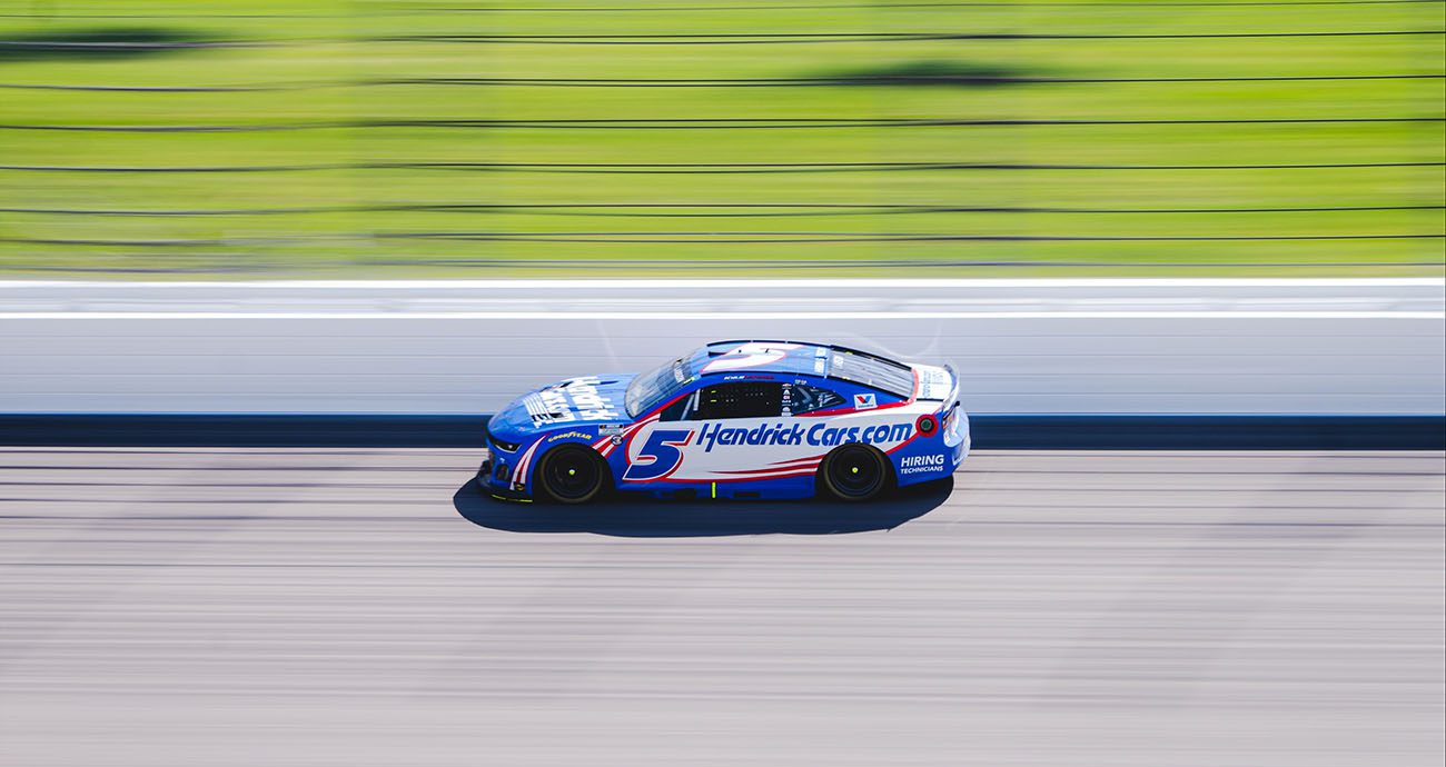 Kyle Larson surges ahead to win Stage 2 at Kansas - NASCAR