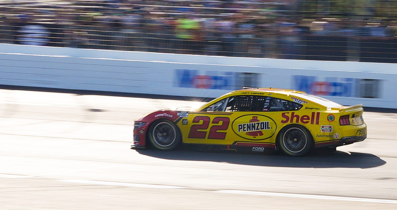 Joey Logano spins from the lead off Turn 4 late | NASCAR